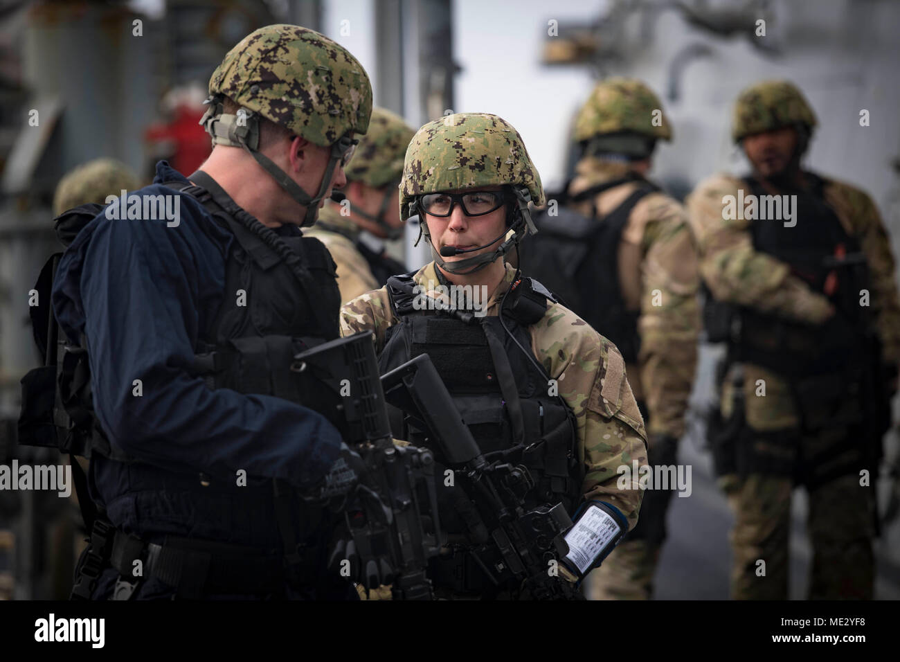 U.S. Navy Lt. Alexandra Feltes, right, speaks with Chief Cryptologic ...