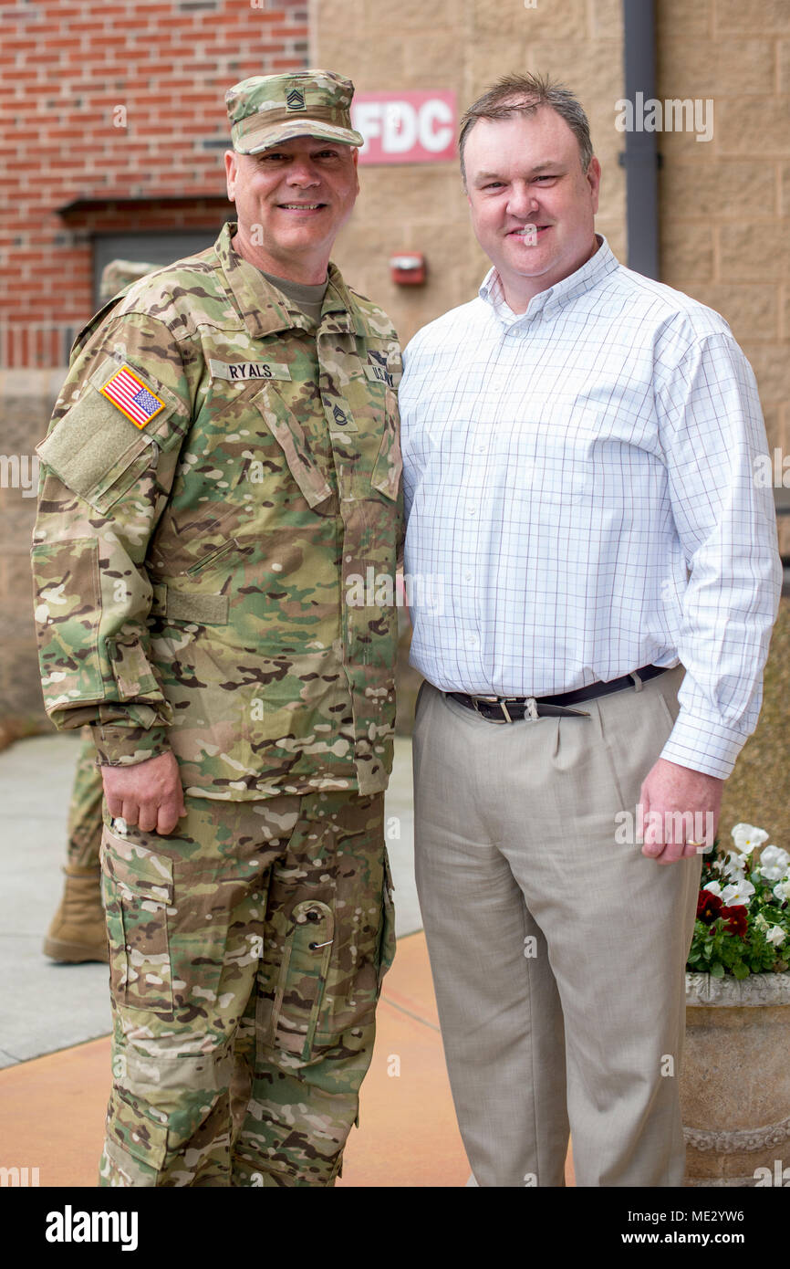 Sgt. 1st Class Raymond Ryals stands with his pastor, Joe Francisco ...