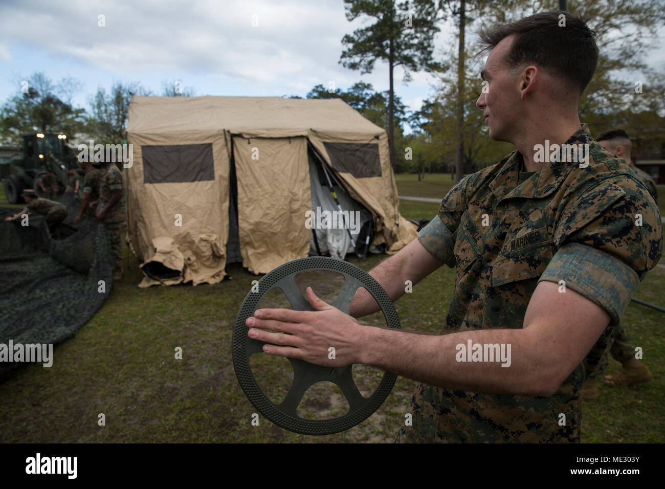 U.S. Marine Corps Cpl. Jason Dunkle with Combat Logistics Regiment 2 ...