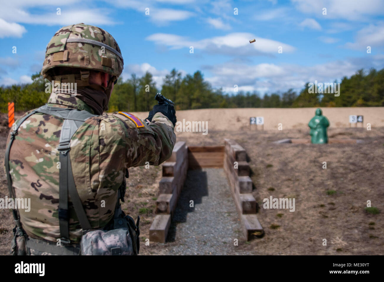 Specialist John Mundey, of the 463rd Engineer Battalion, 412th Theatre ...