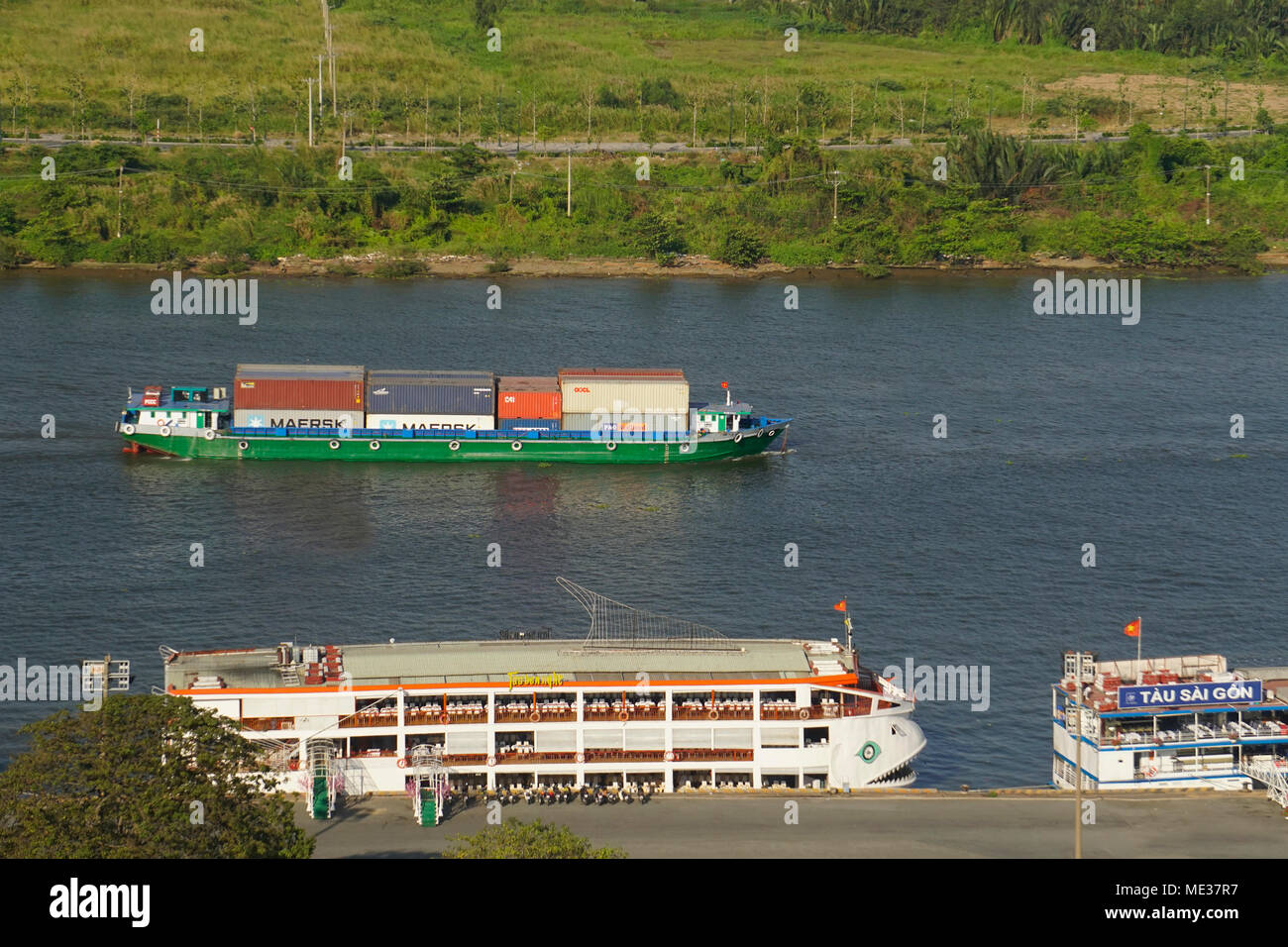 Barge carrying shipping containers on the Saigon River boats, Ho Chi ...