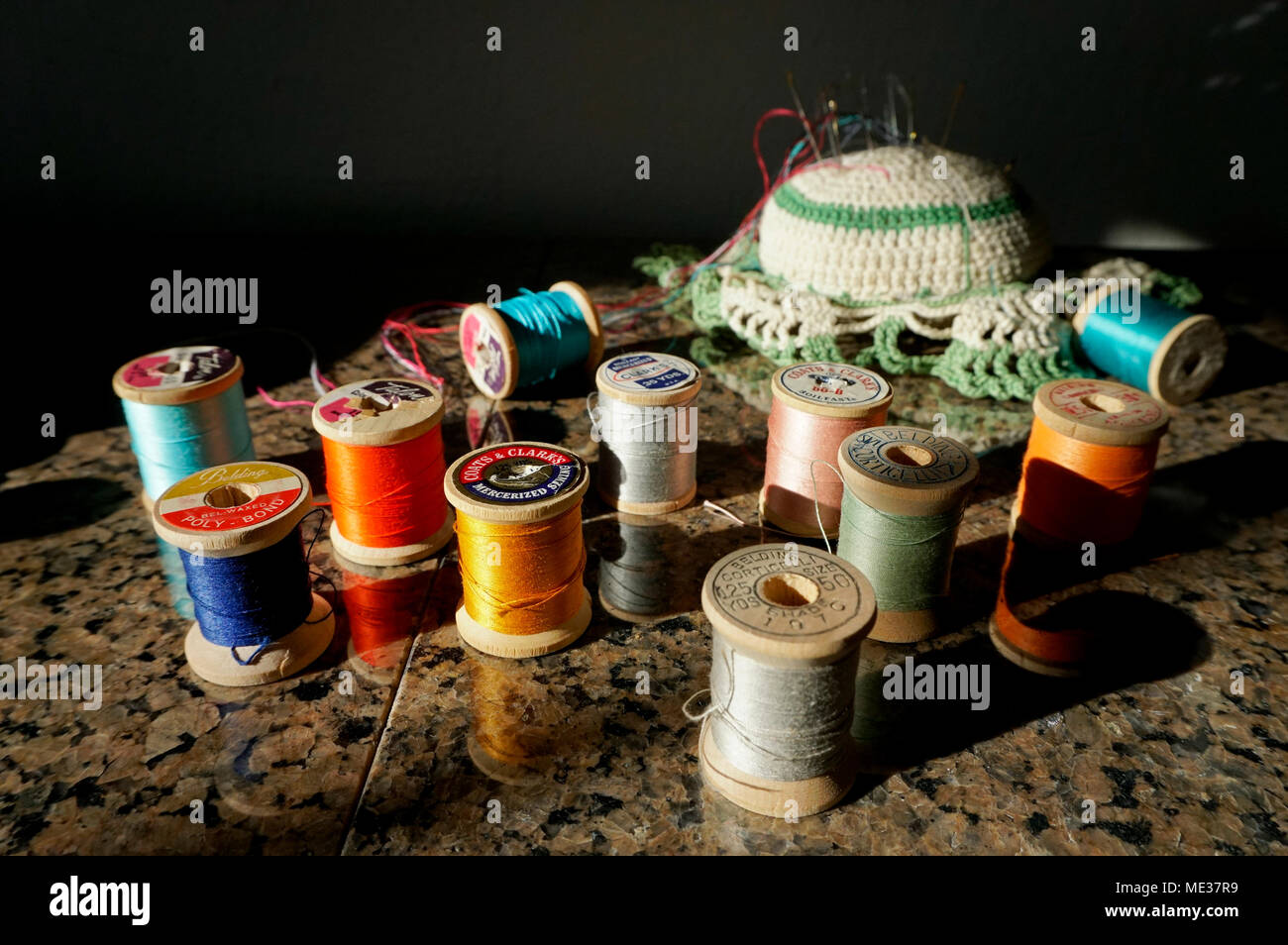 Old sewing thread spools hi-res stock photography and images - Alamy