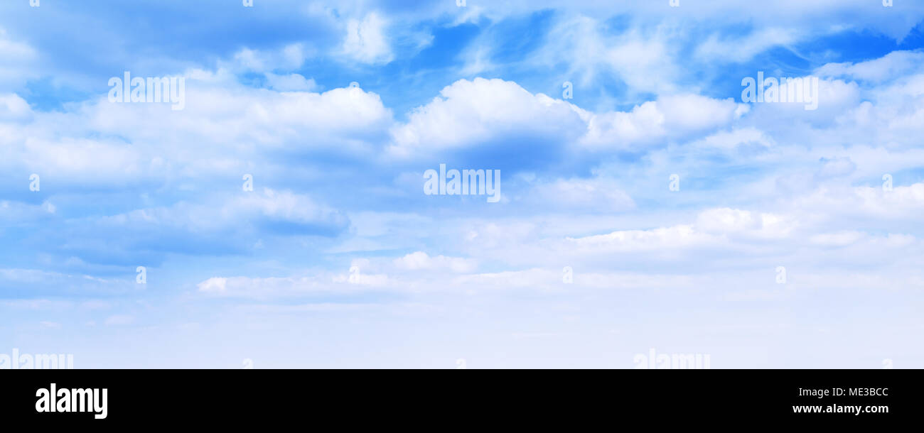 Wide blue sky background with cumulus clouds, natural photo Stock Photo ...