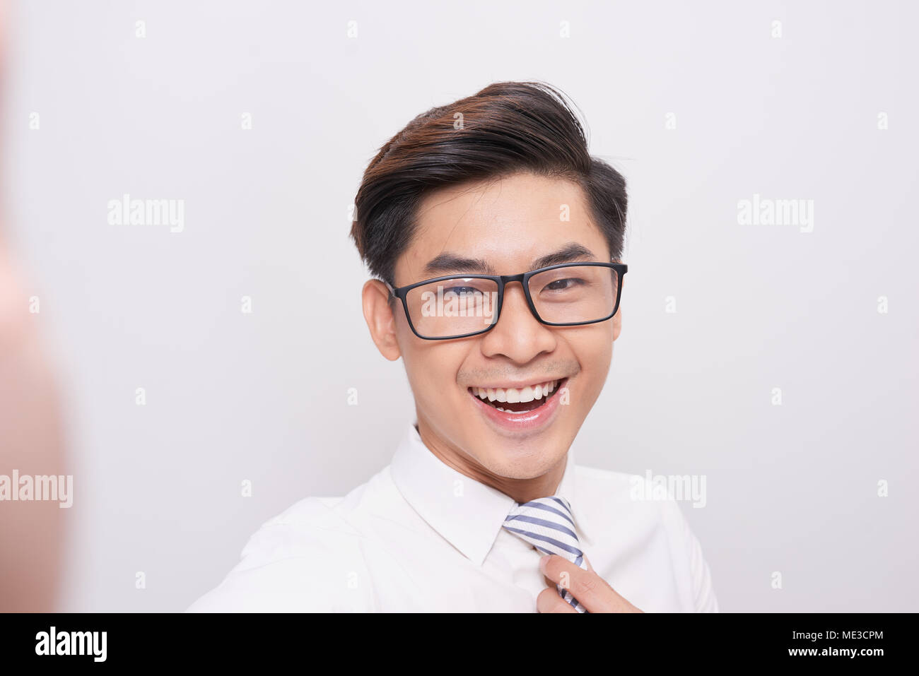 Business man smiling hi-res stock photography and images - Alamy