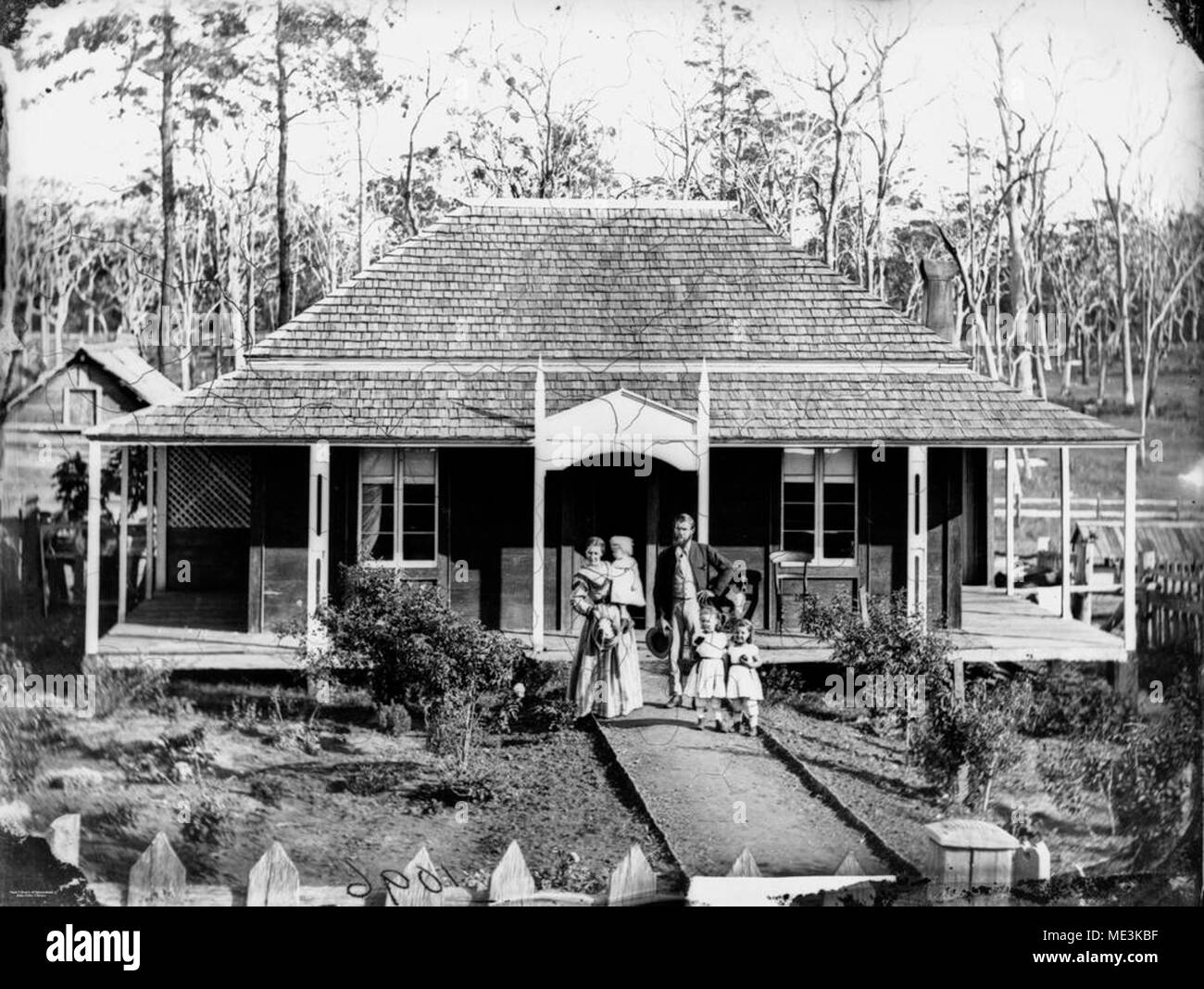 Family standing outside their homestead in the Albert and Logan Stock ...