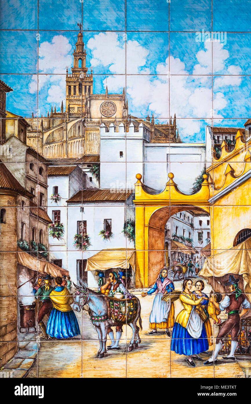 Old tiles with a medieval street scene from old Seville, Andalusia ...