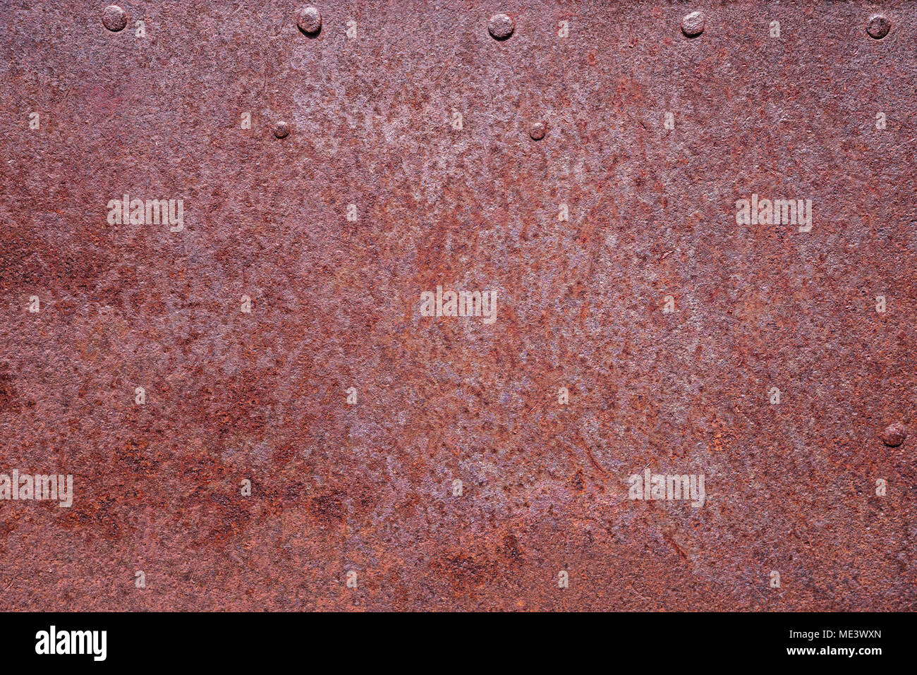 rusty metal background with a few rivets Stock Photo - Alamy