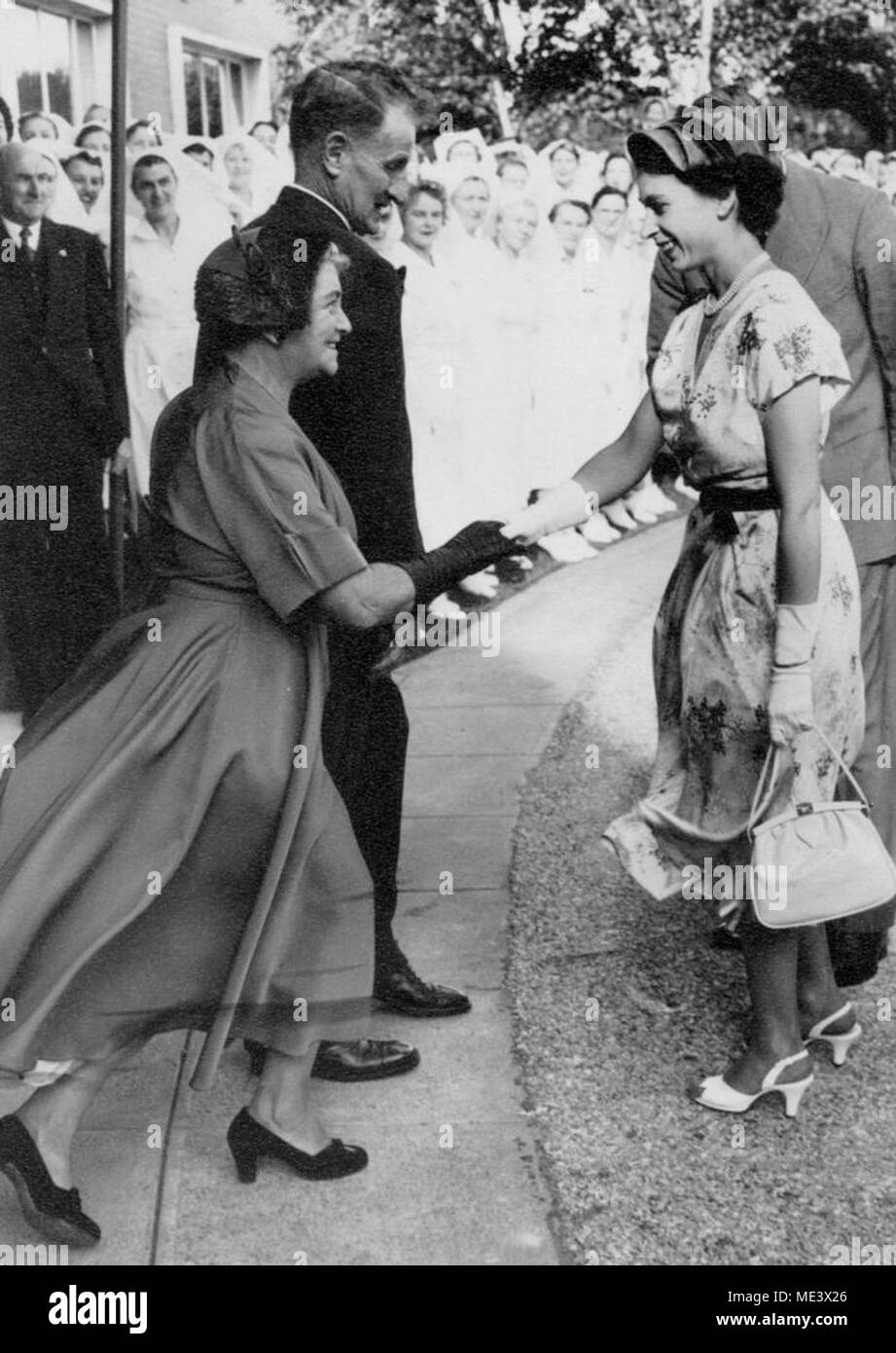 Lady Cooper is presented to Queen Elizabeth Stock Photo - Alamy