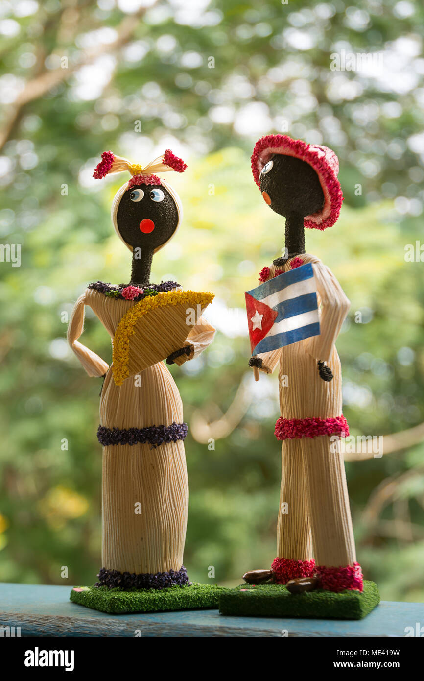 Cuban craft puppets, she with fan and him with Cuban flag Stock Photo ...