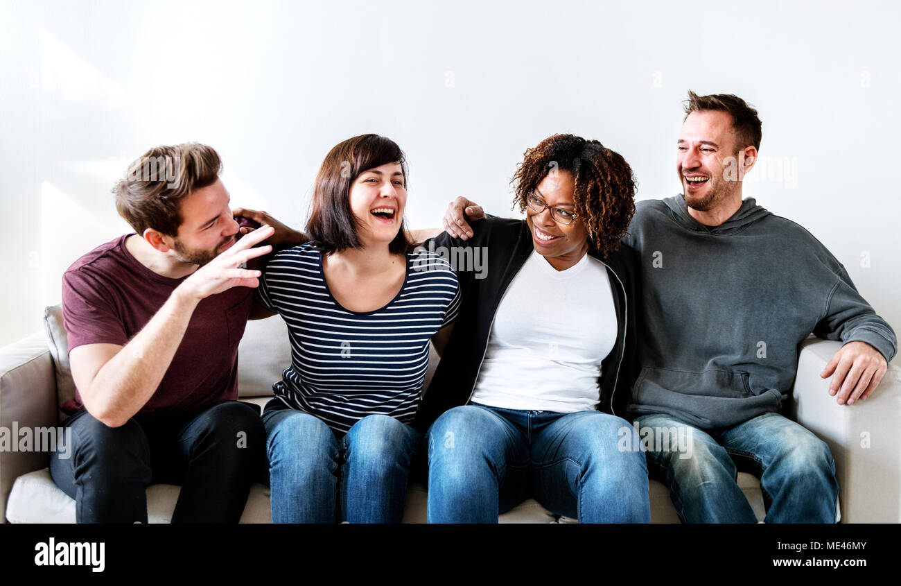 Friends talking together Stock Photo - Alamy