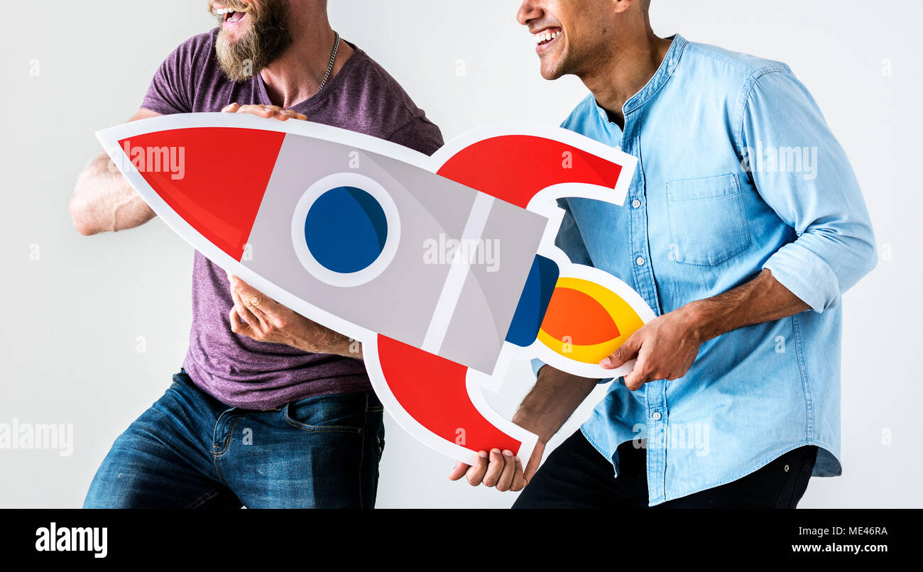 People holding rocketship icon Stock Photo - Alamy