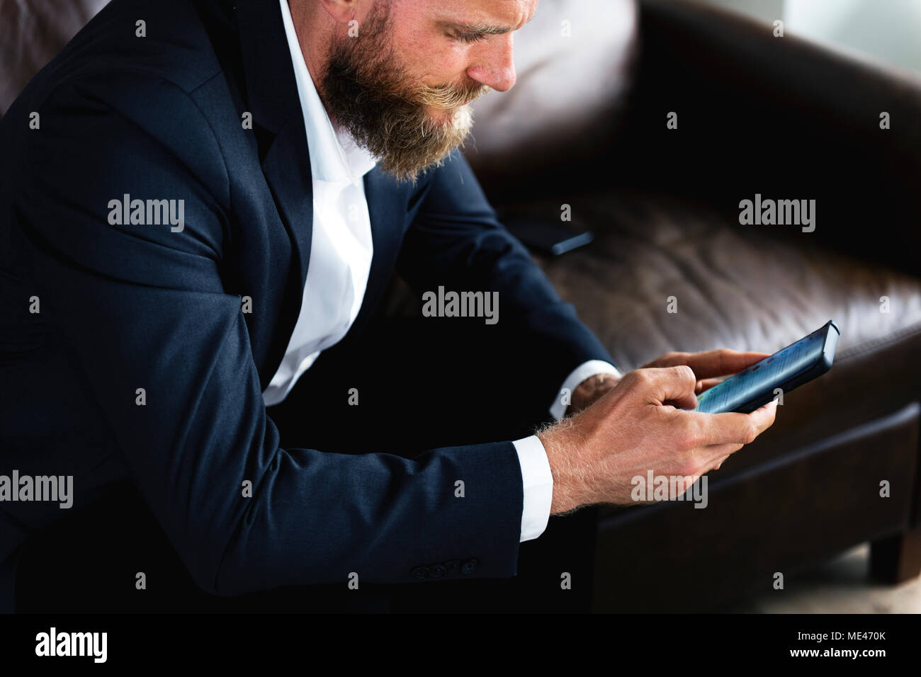 White man using mobile phone Stock Photo - Alamy