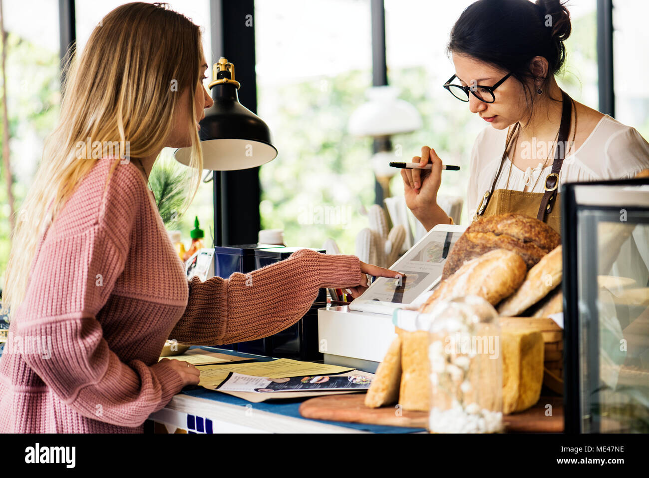 Ordering counter interaction hi-res stock photography and images - Alamy