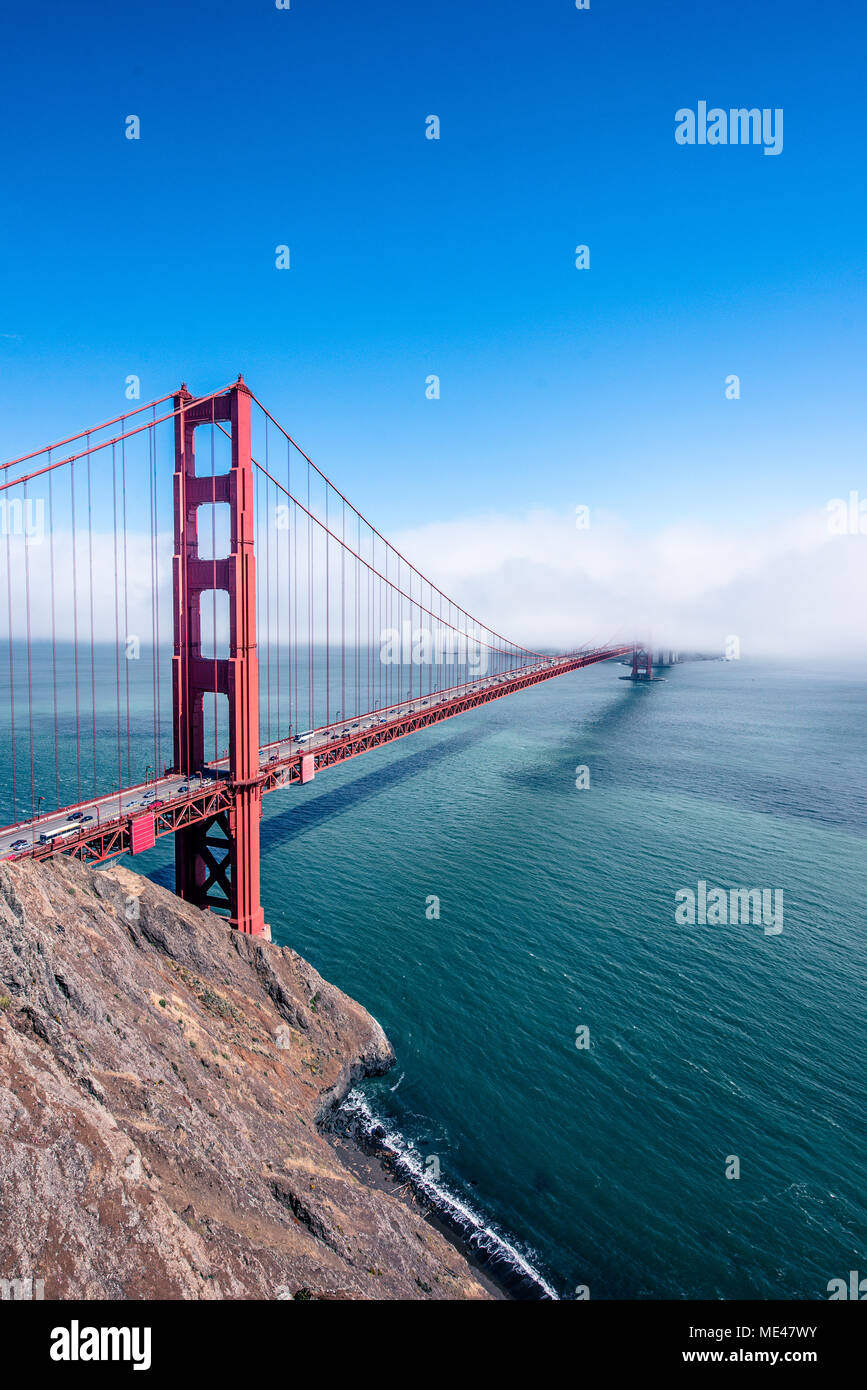 Golden Gate Bridge in clouds on a beautiful summer day - Panoramic view ...