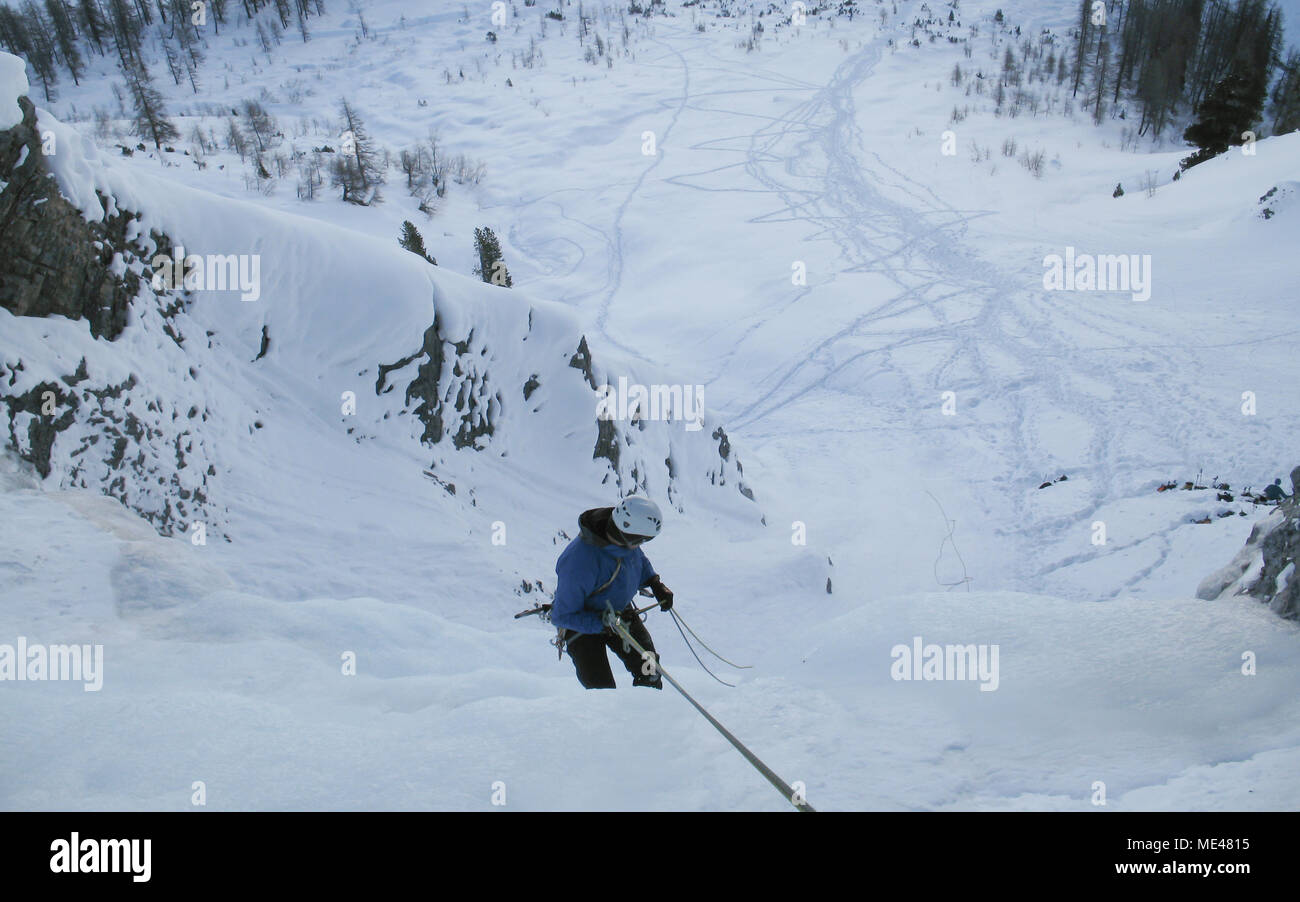 ice climbing in deep winter in the Swiss Alps in the Sertig Valley near ...