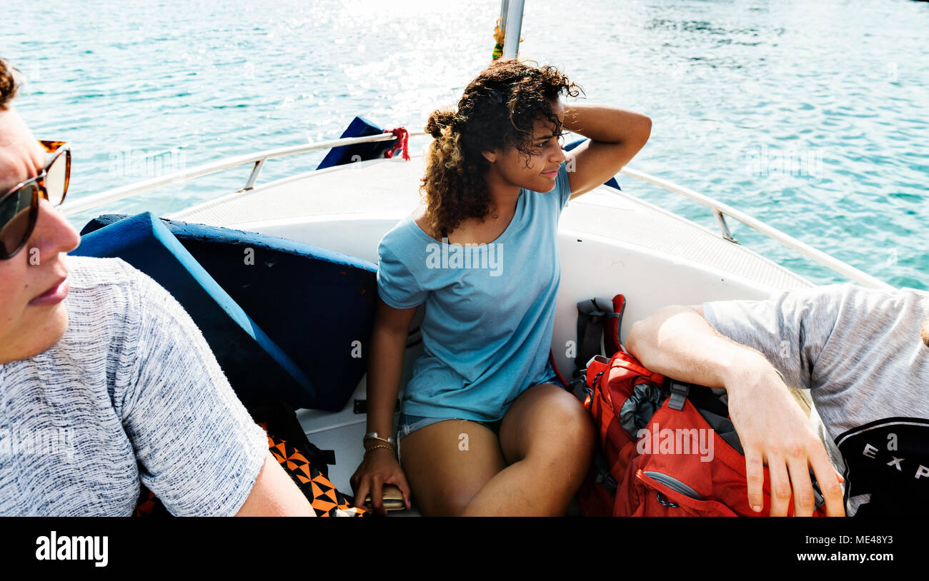People riding a boat Stock Photo - Alamy