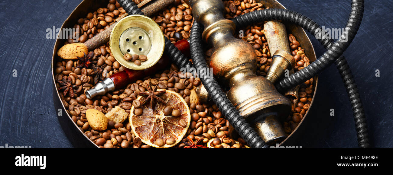 Smoke hookah with with coffee beans and shisha concept.Hookah concept ...