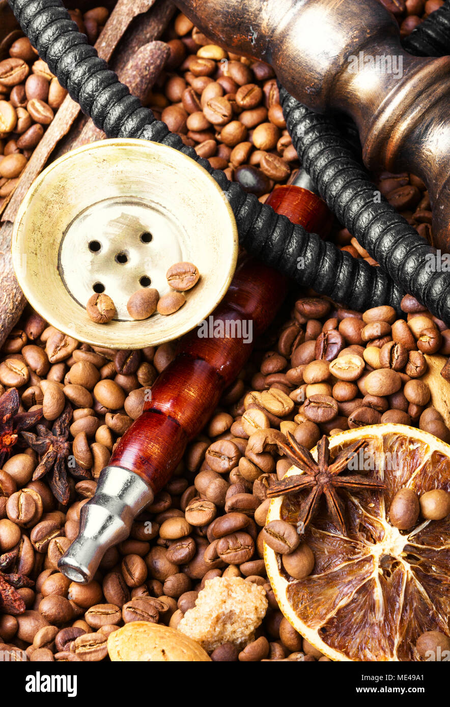 Smoke hookah with with coffee beans and shisha concept.Hookah concept ...