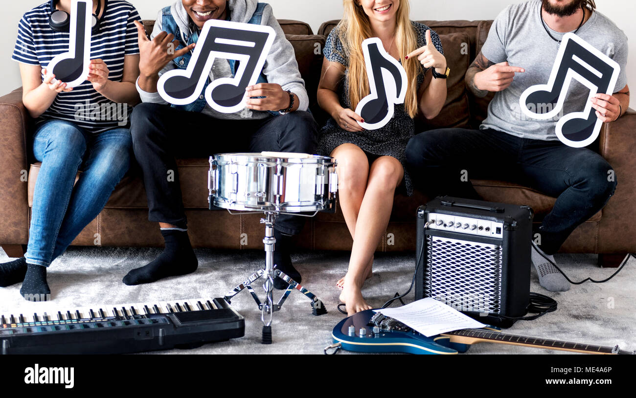 Friends enjoying the music Stock Photo - Alamy