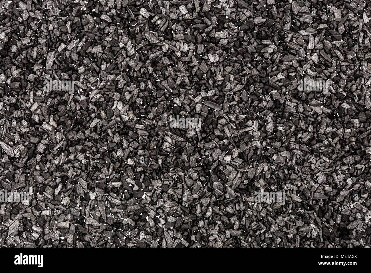 Background from black charcoal closeup. Coal texture, view from above ...