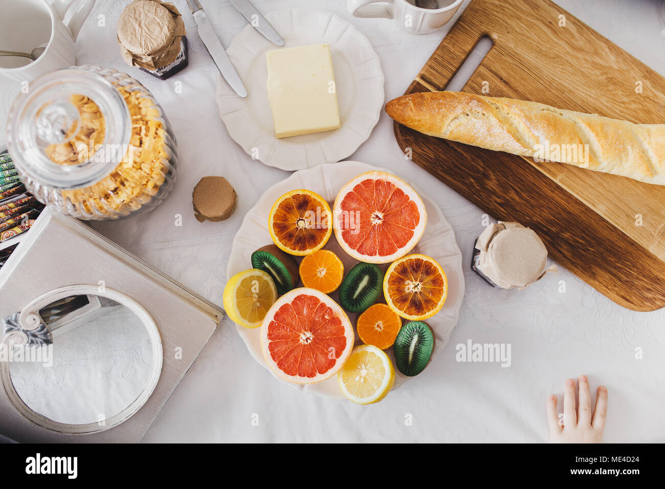 Having morning family breakfast on the kitchen top view Stock Photo - Alamy