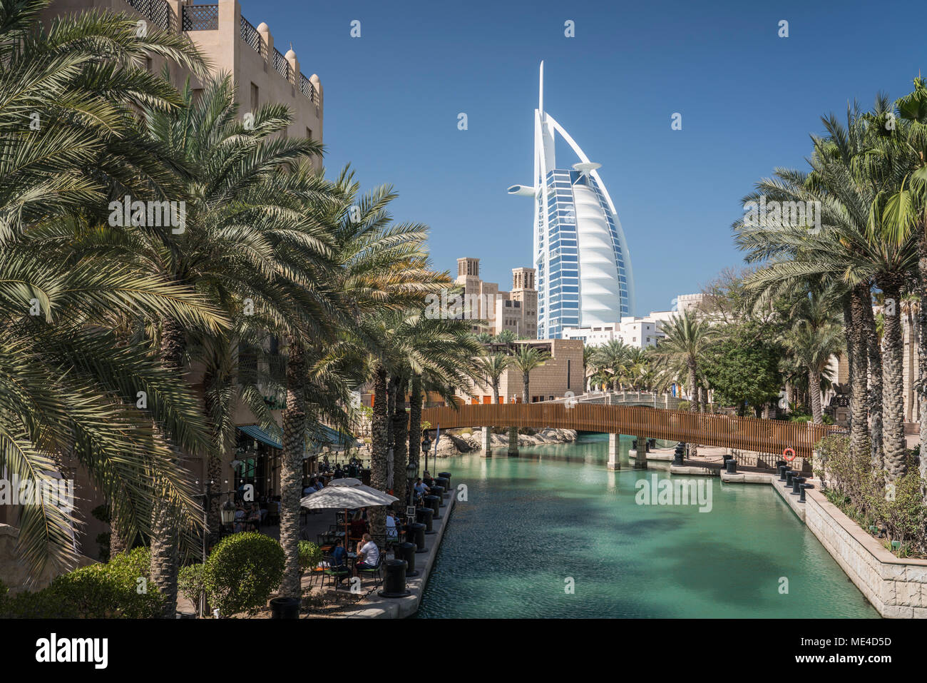 The Madinat Jumeirah canal and waterway with the white Burj Al Arab in ...