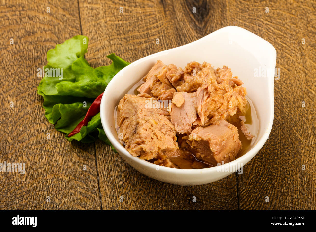 Canned tuna fish in the bowl ready for cooking Stock Photo - Alamy