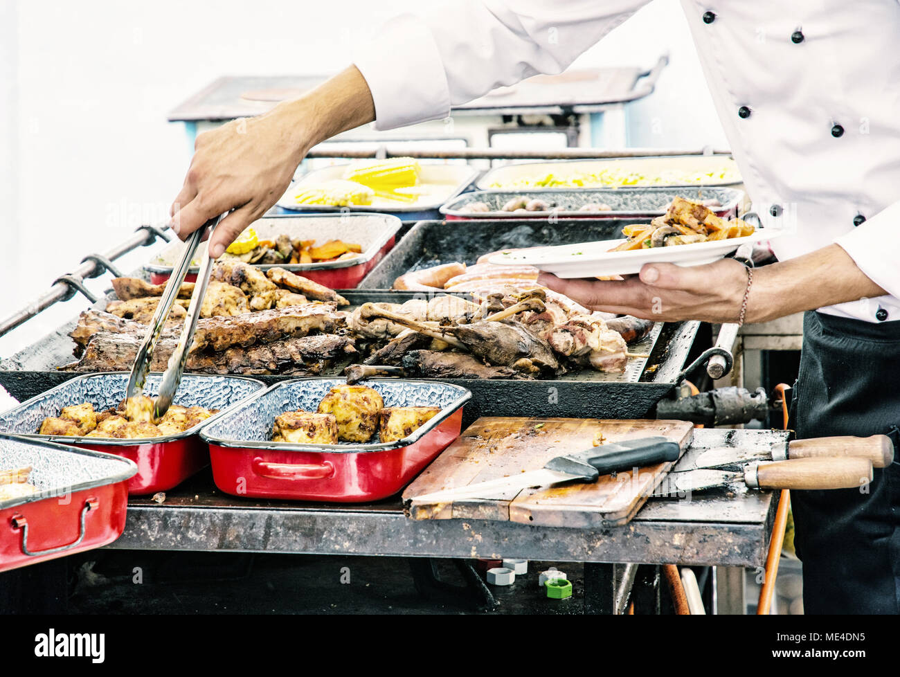 Masterchef serves grilled meat. Detail food and hands scene. Feast ...