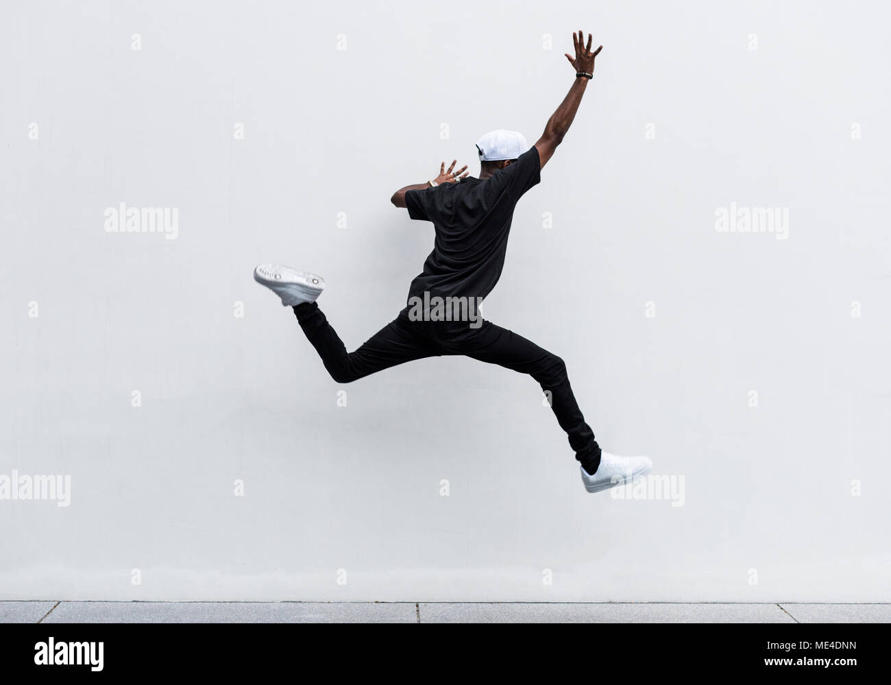 African man jumping Stock Photo - Alamy