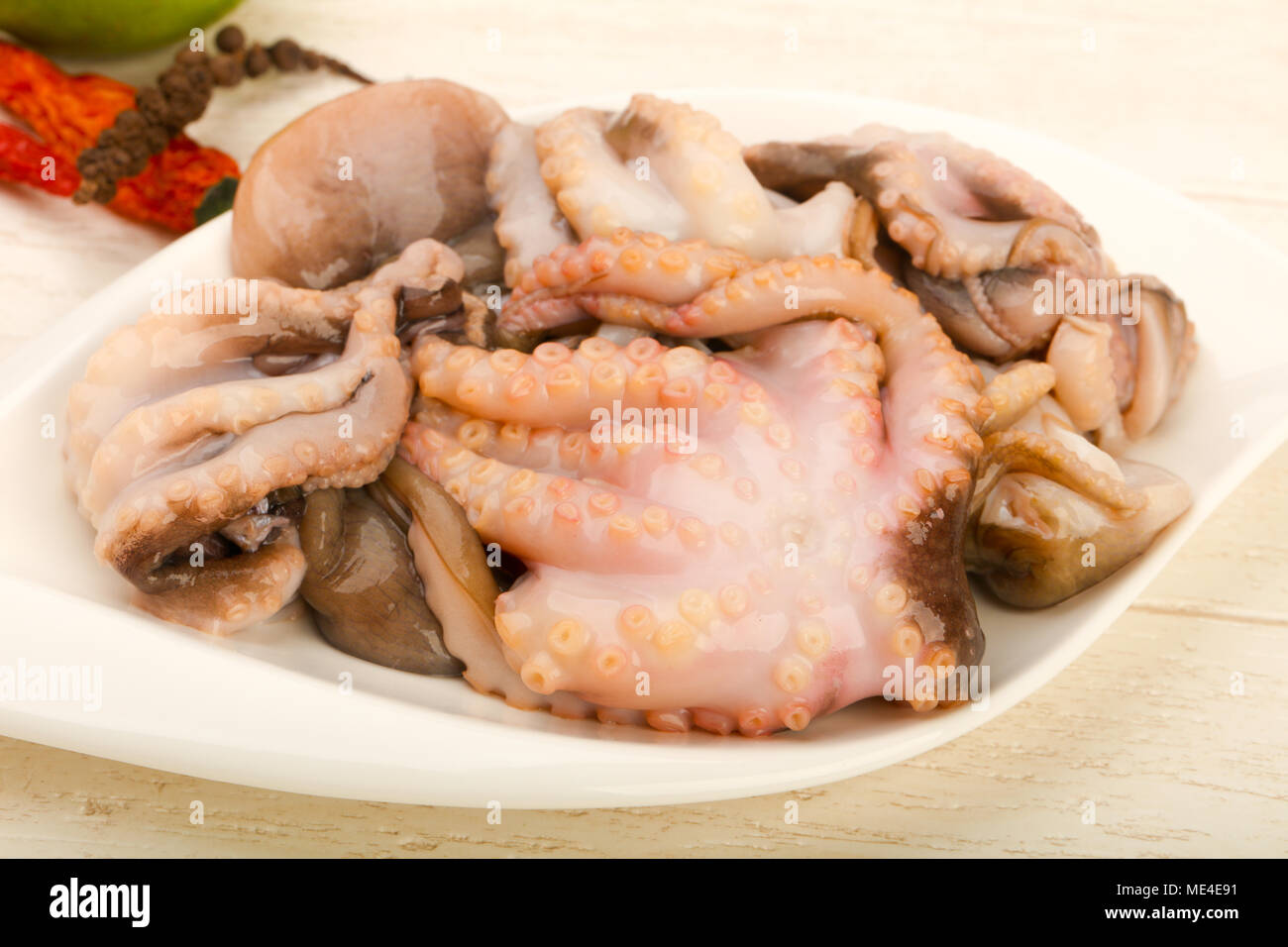 Raw octopus ready for cooking Stock Photo - Alamy