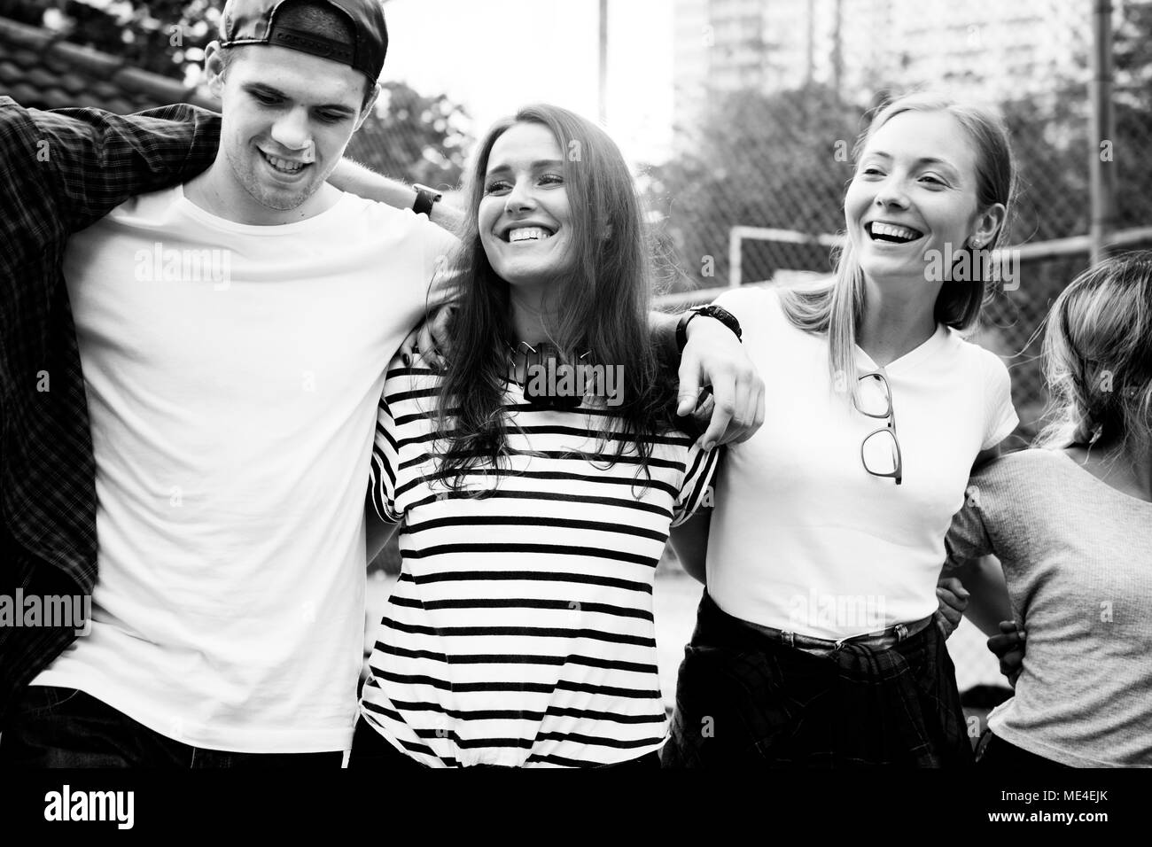 Arms around shoulder hi-res stock photography and images - Alamy