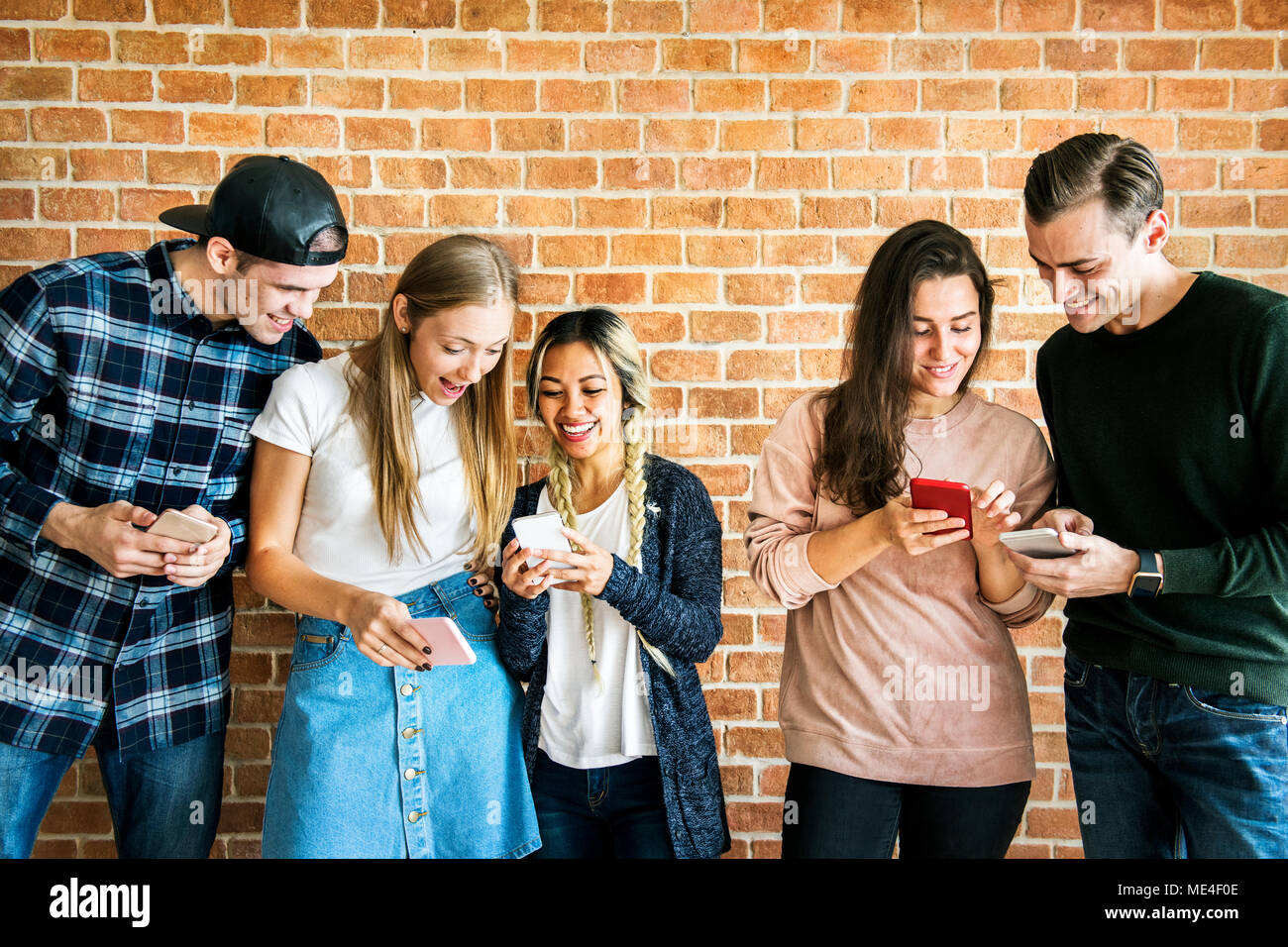 Teenager using social media chinese hi-res stock photography and images ...