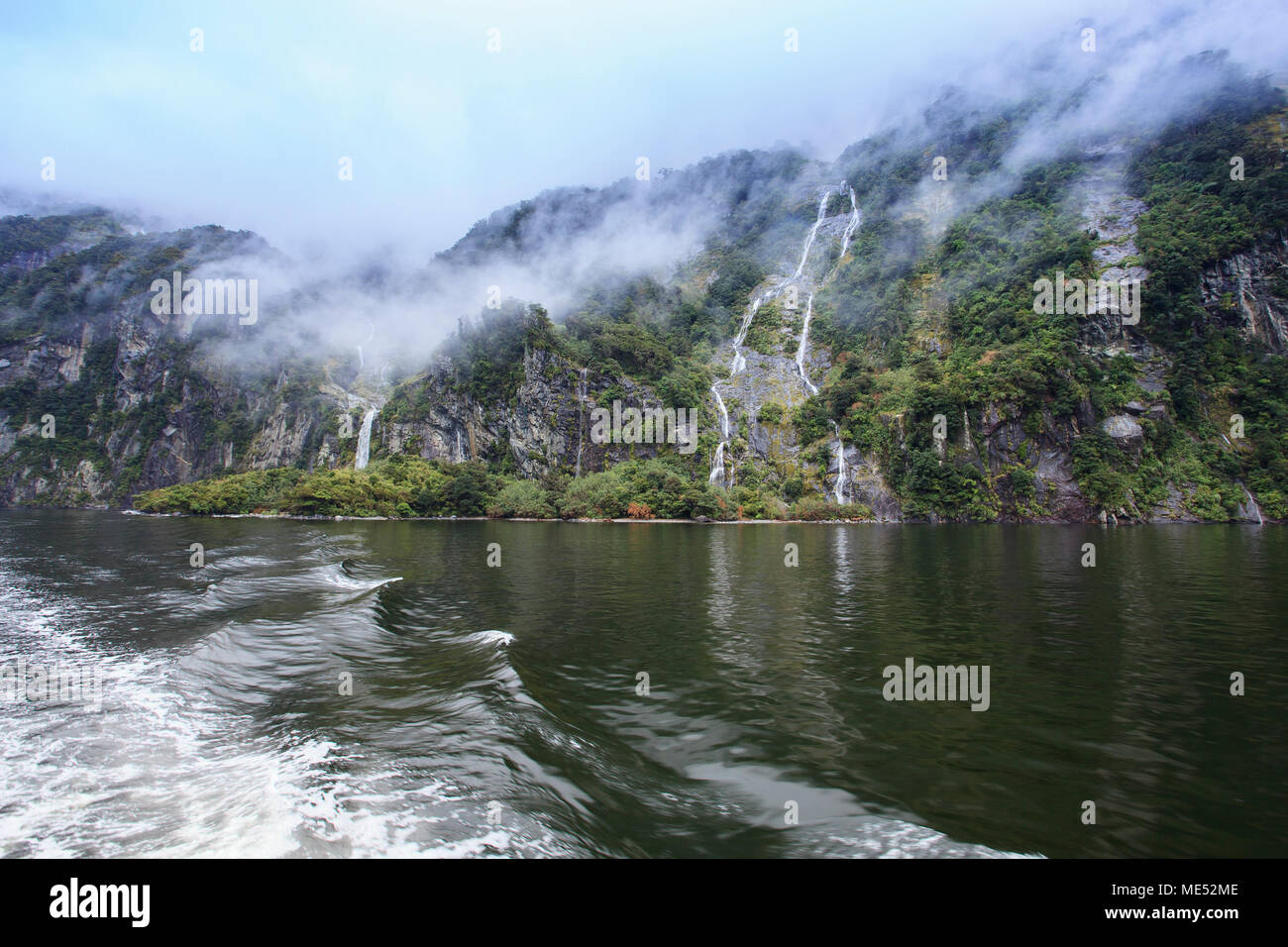 water falls in milford sound fiordland national park new zealand ...