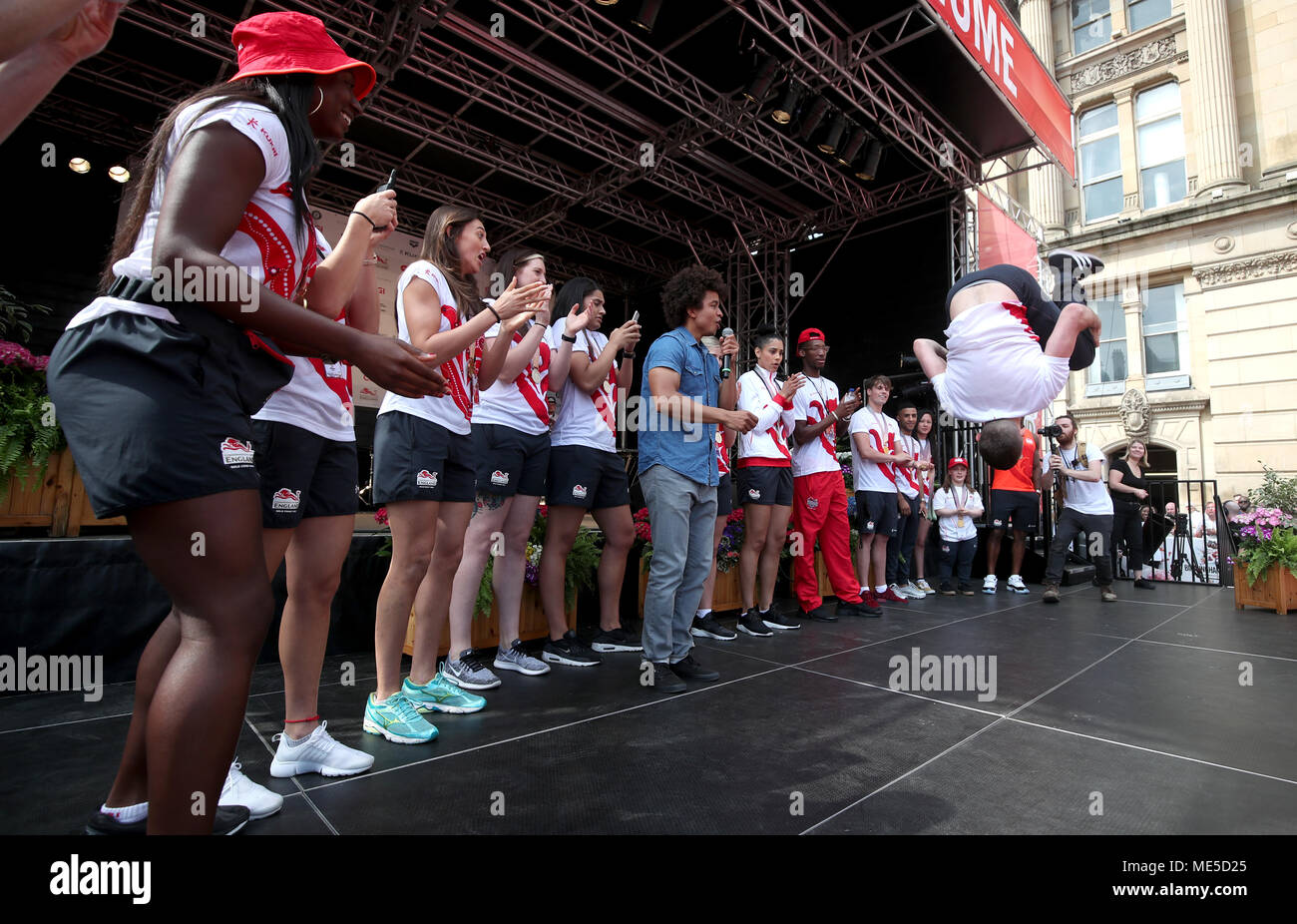 Dominick Cunningham performs a back flip on stage during the ...