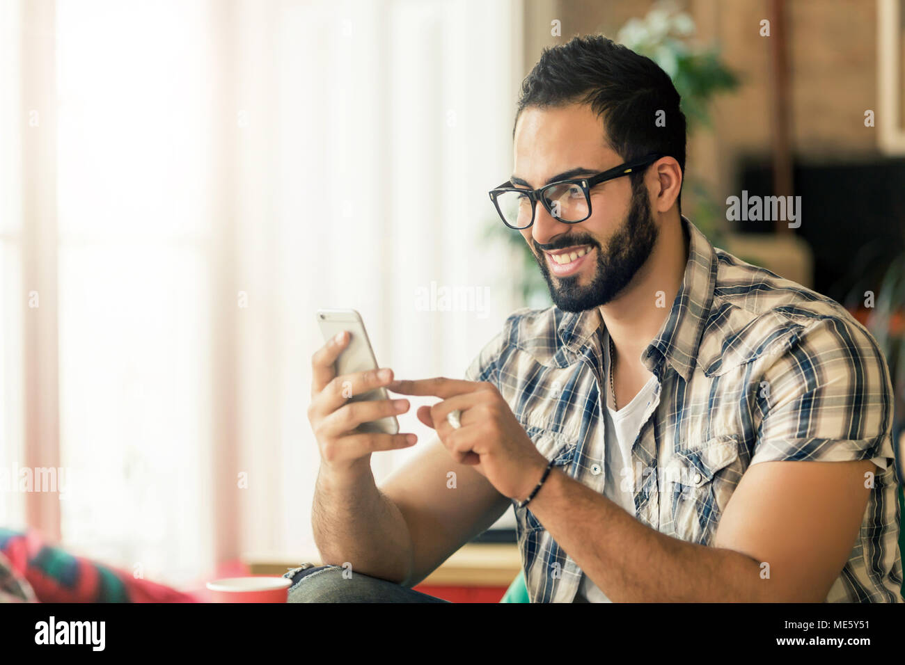 Black bearded man standing hi-res stock photography and images - Alamy