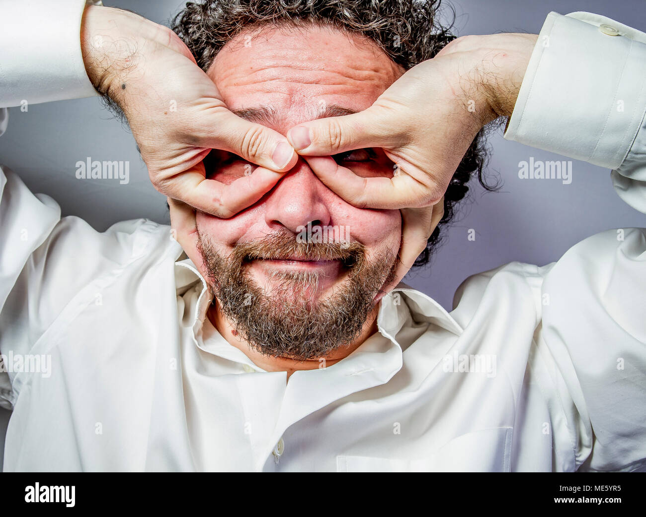 imagination and madness, man with intense expression, white shirt Stock ...