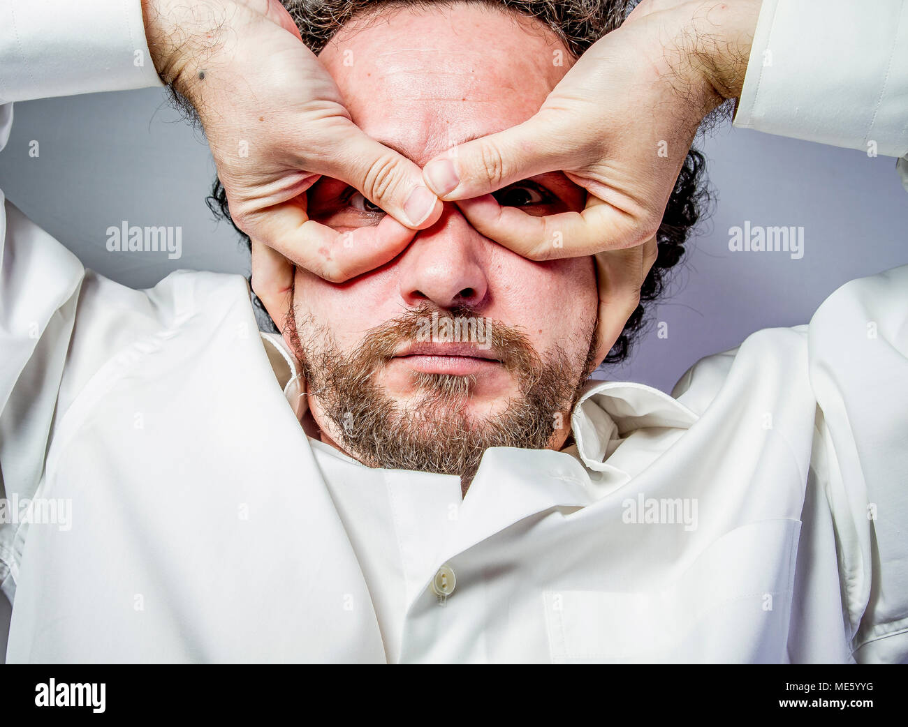 imagination and madness, man with intense expression, white shirt Stock ...