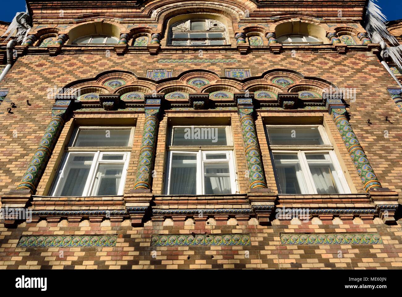 Moscow, Russia - March 18, 2018. Tiled facade of Lopatina building on ...