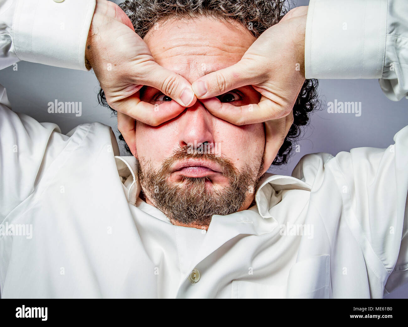 imagination and madness, man with intense expression, white shirt Stock ...