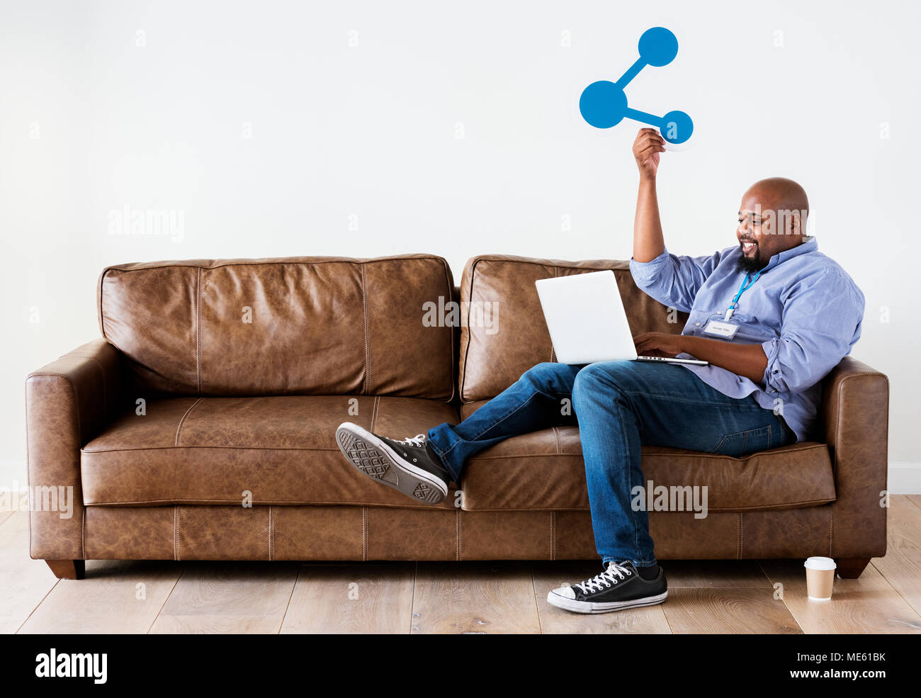 Black man working on laptop Stock Photo - Alamy