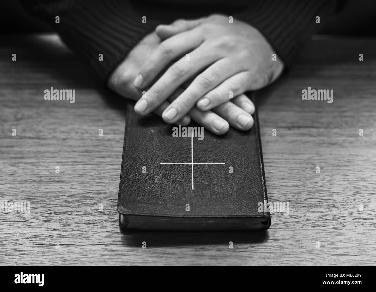 Bible on table priest hi-res stock photography and images - Alamy