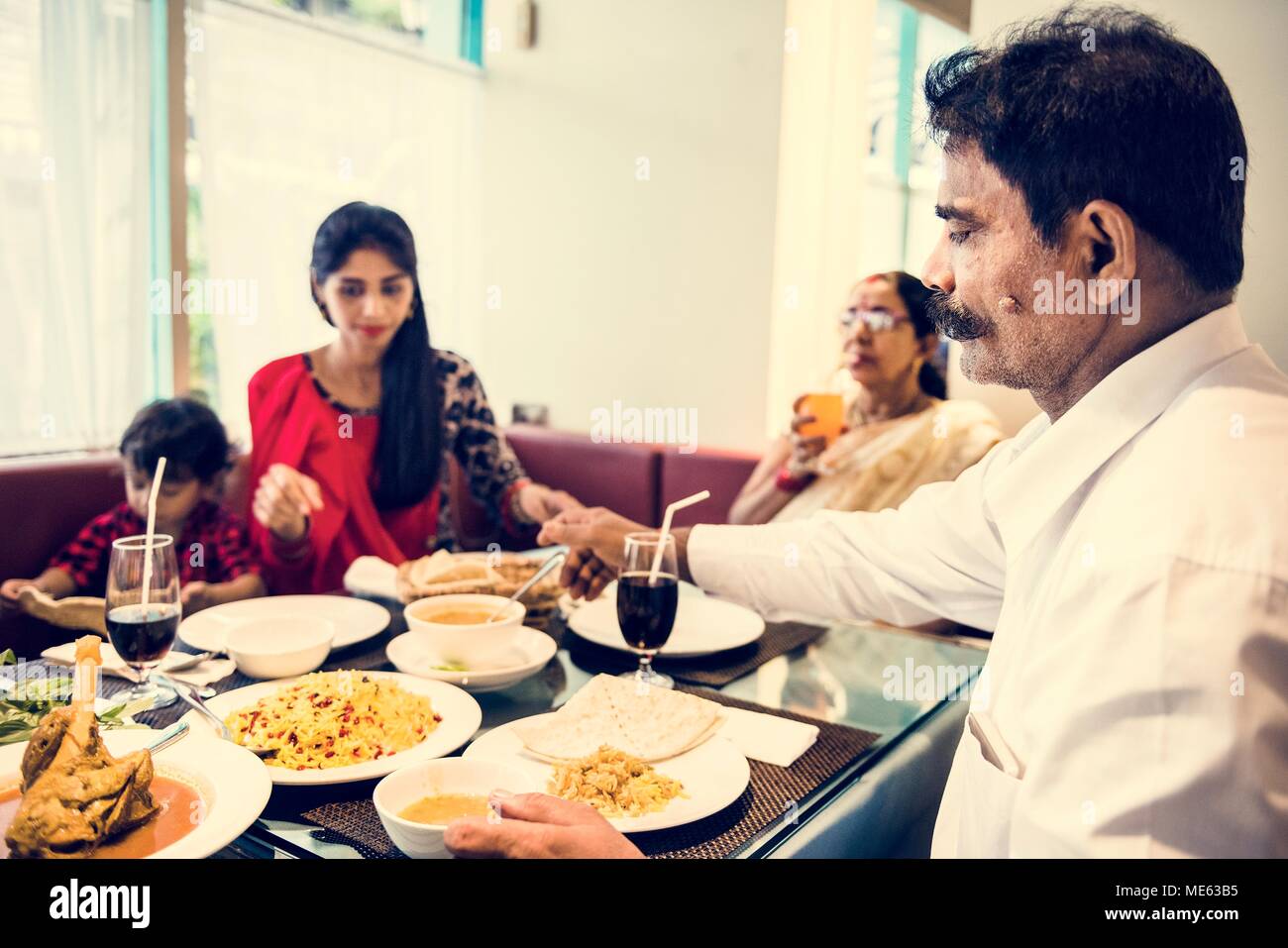 India family dinner hi-res stock photography and images - Alamy