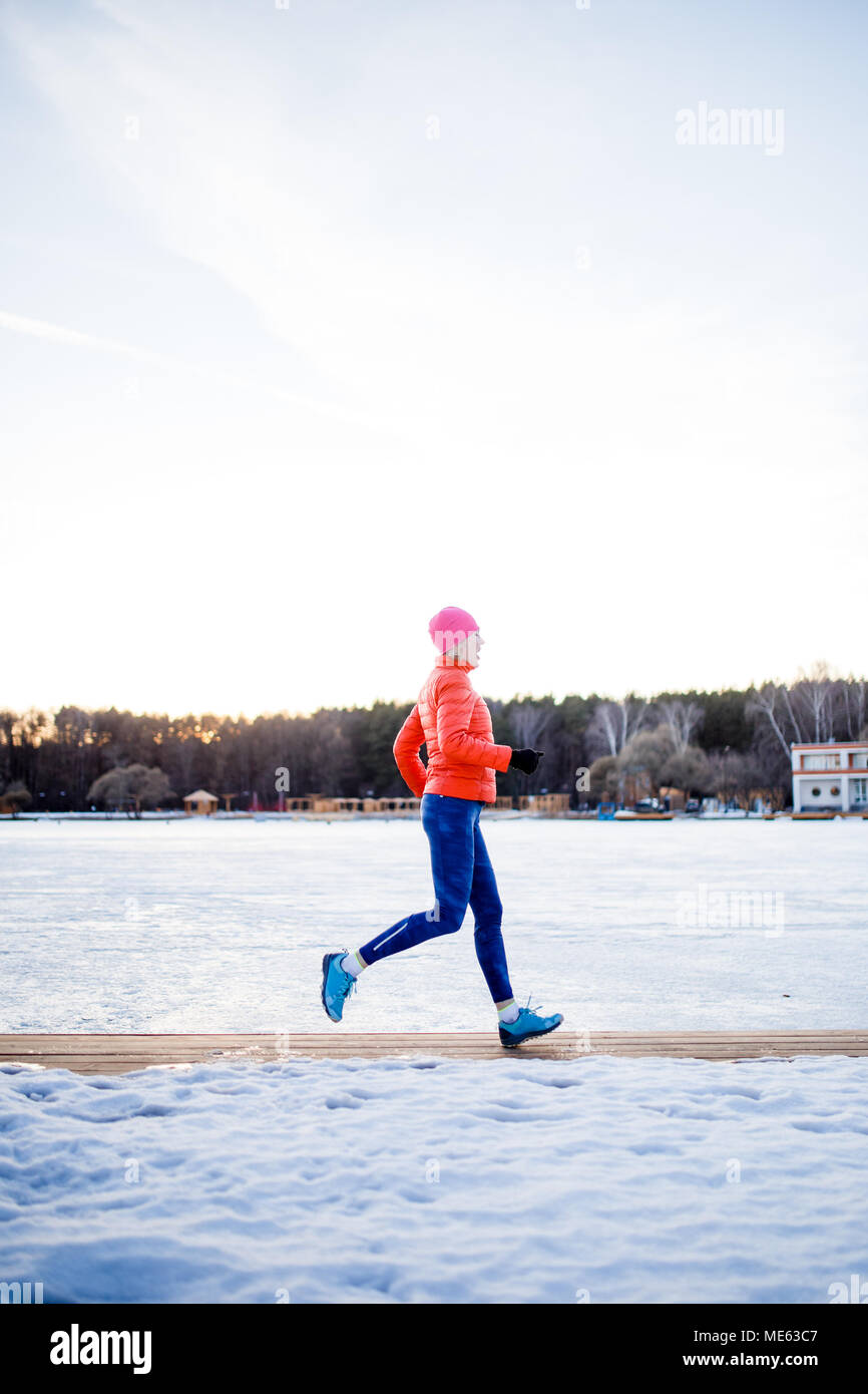 Picture of sports girl on morning exercise in winter Stock Photo - Alamy