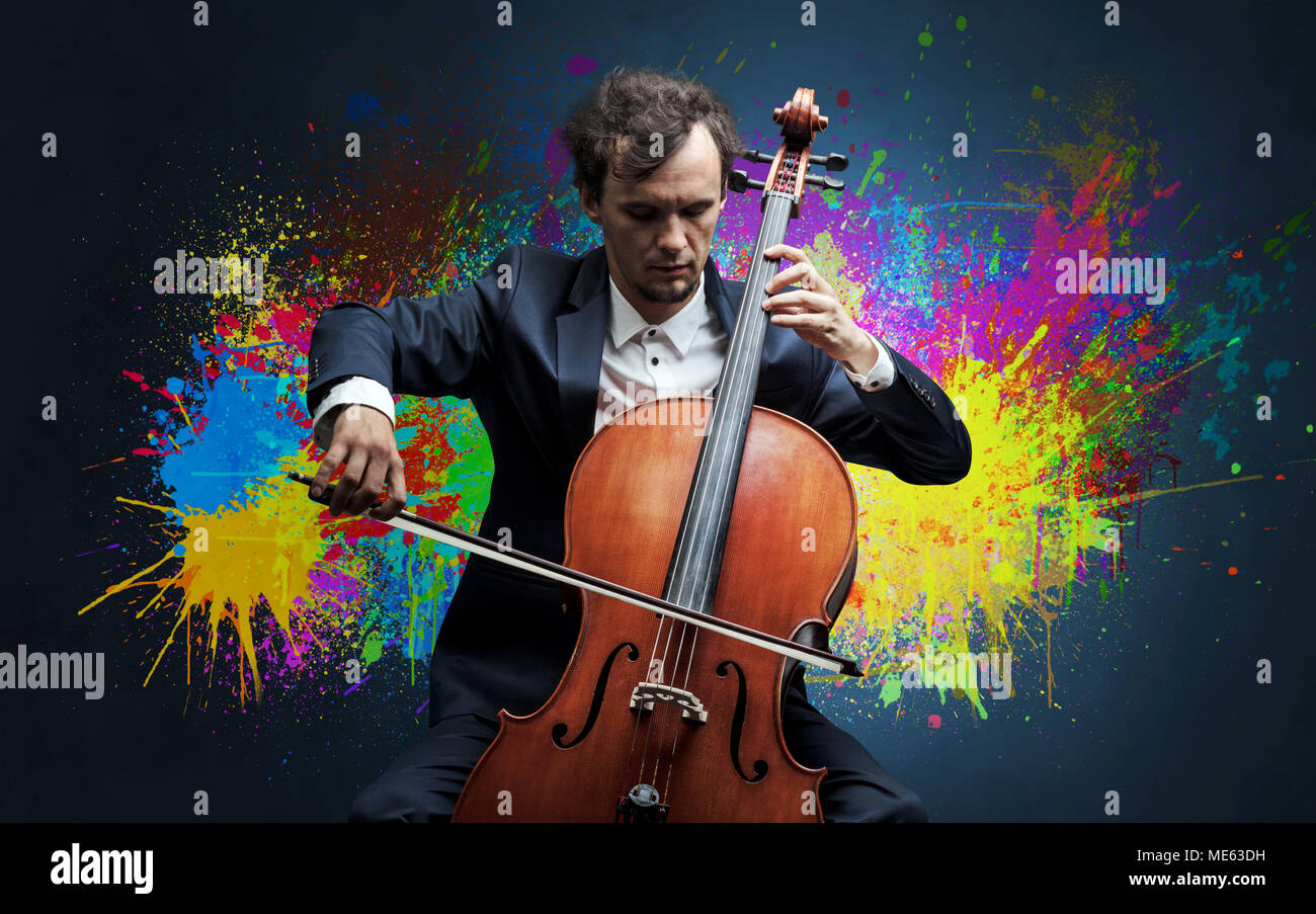 Young classical musician with colorful splotch wallpaper Stock Photo ...