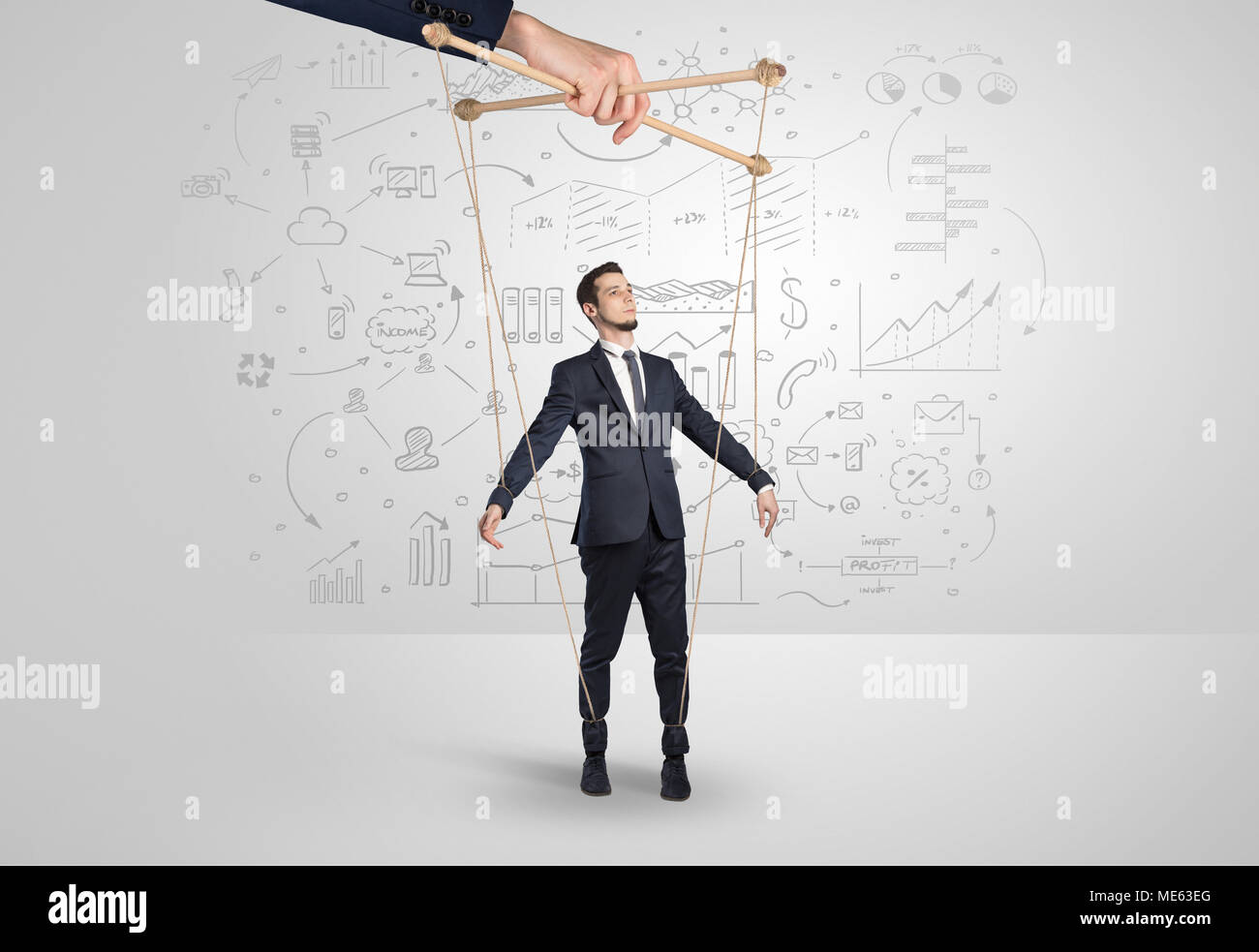 Little businessman controlled from above like a puppet concept Stock ...