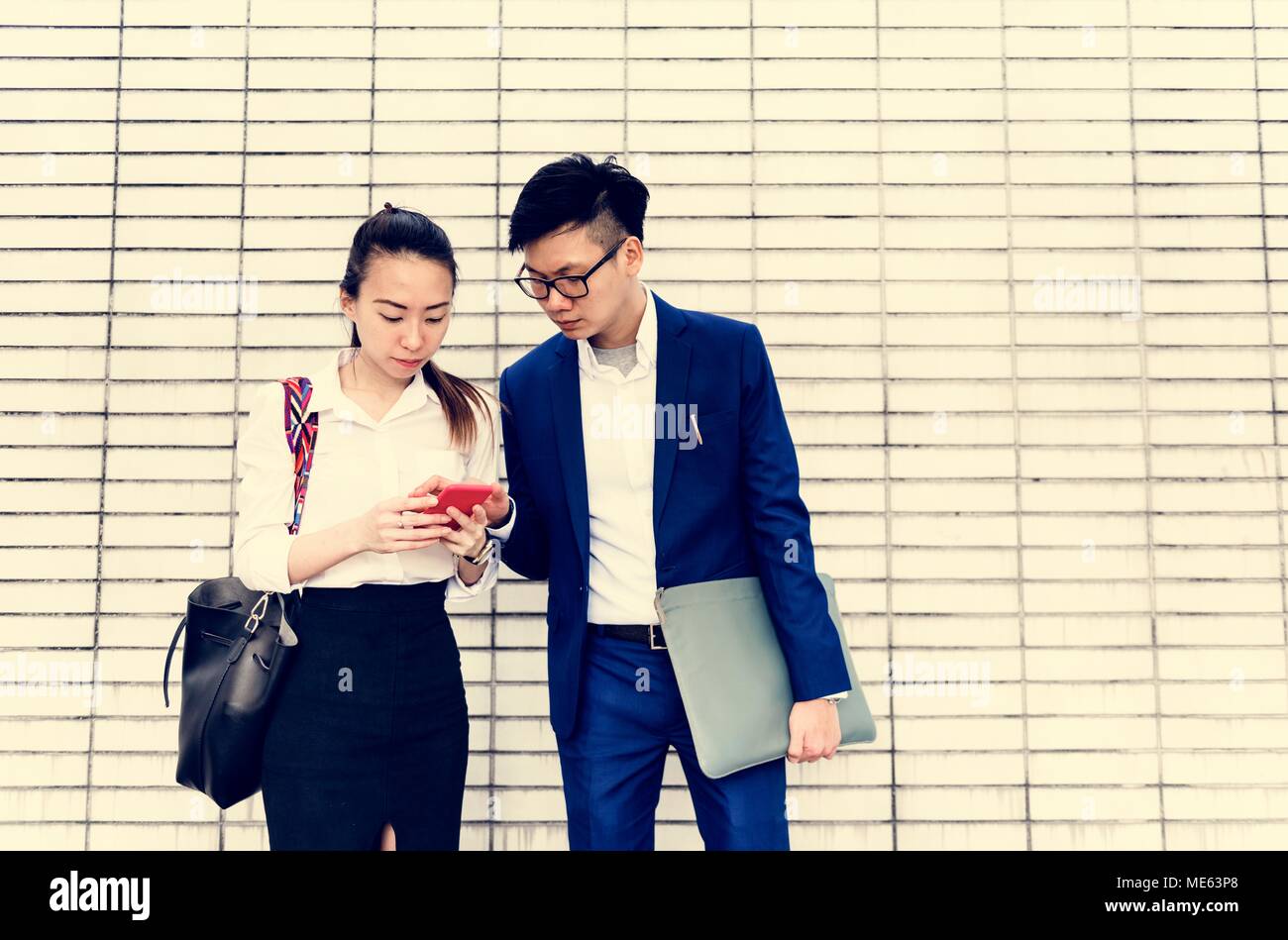 Asian business people discussing Stock Photo - Alamy