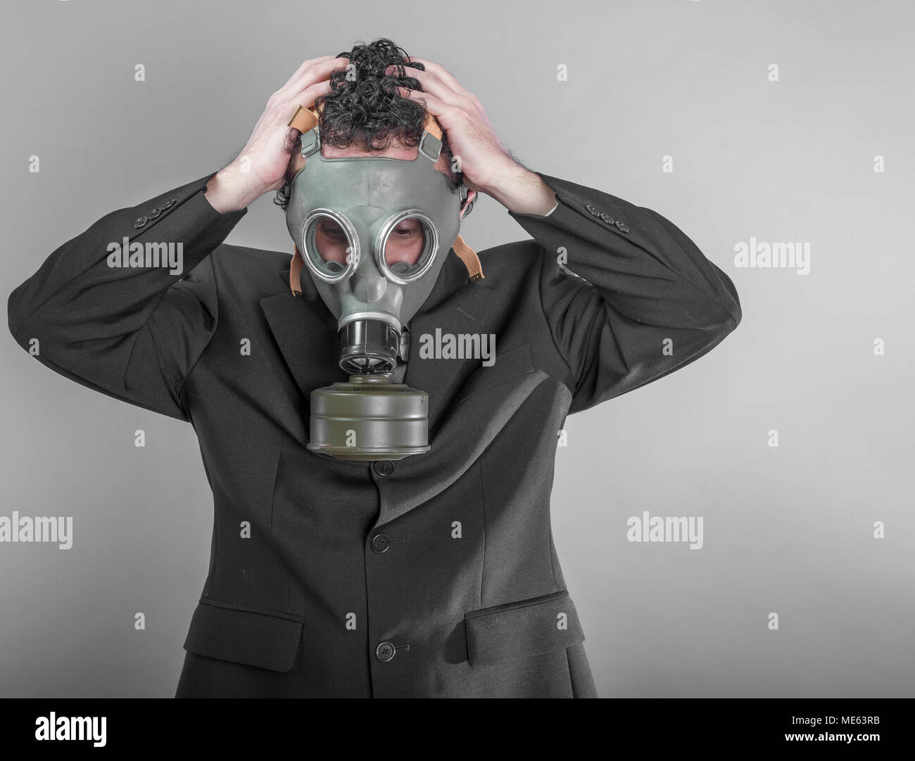 Portrait of a man choking in a polluted city Stock Photo - Alamy