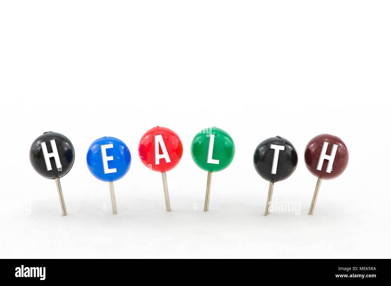 Health, colorful paper pins with conceptual words. Isolated on white ...