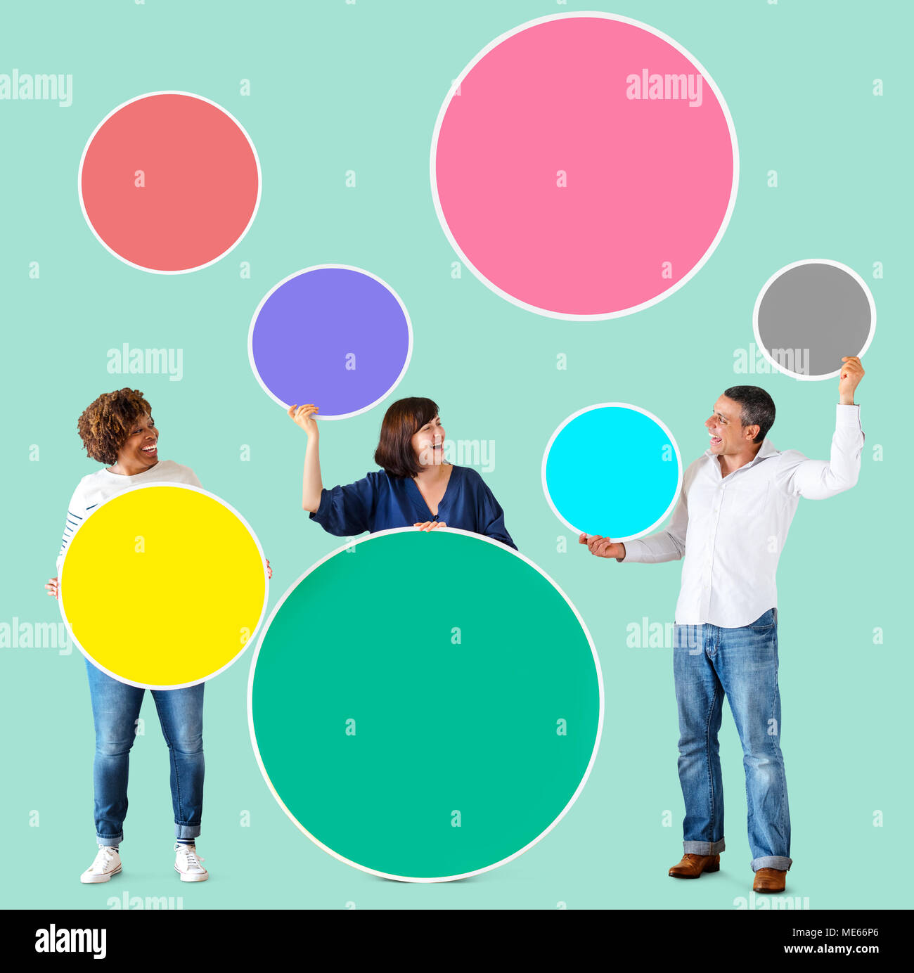 Diverse people holding colorful blank circles Stock Photo - Alamy