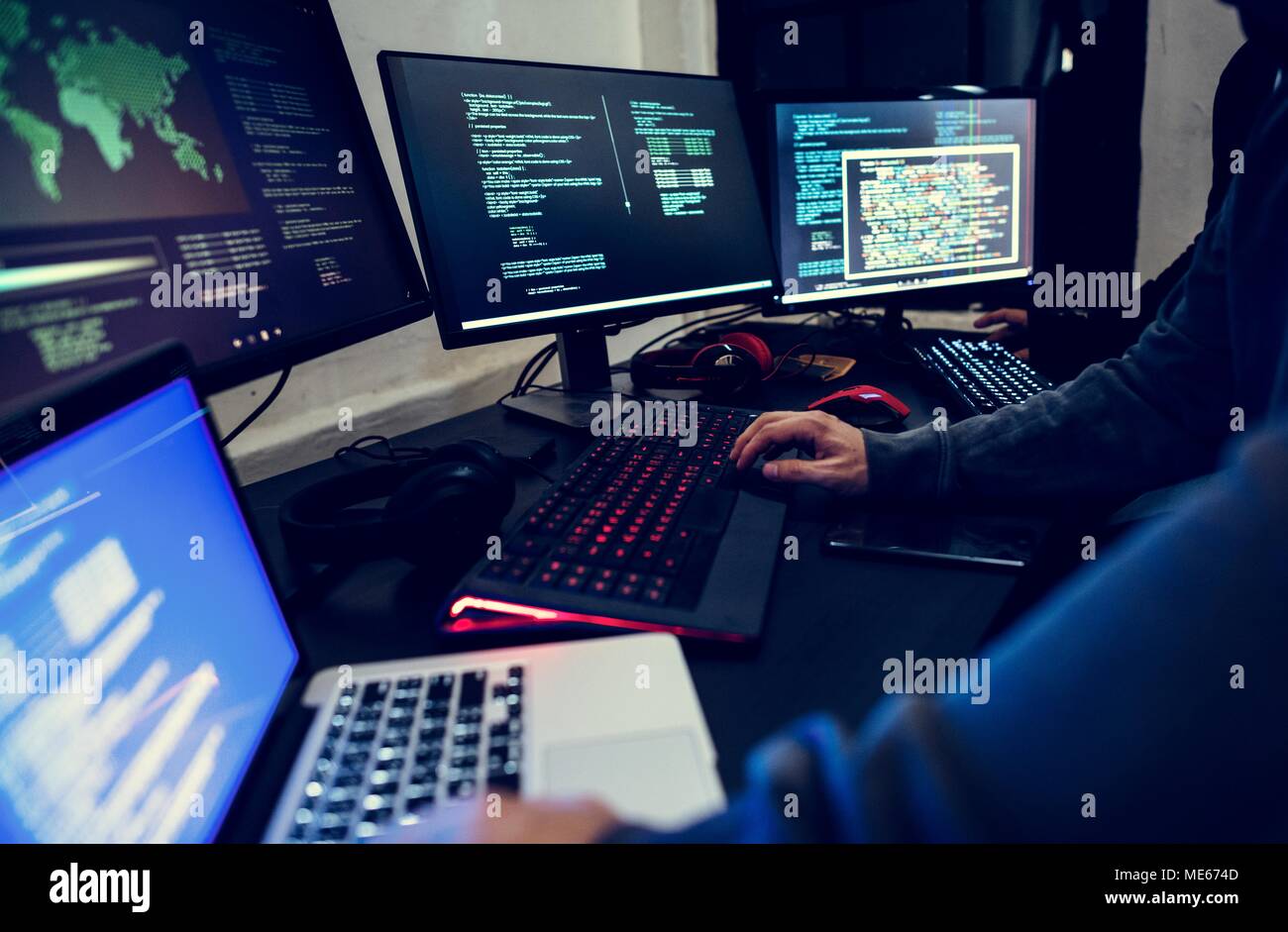 Diverse computer hacking shoot Stock Photo - Alamy